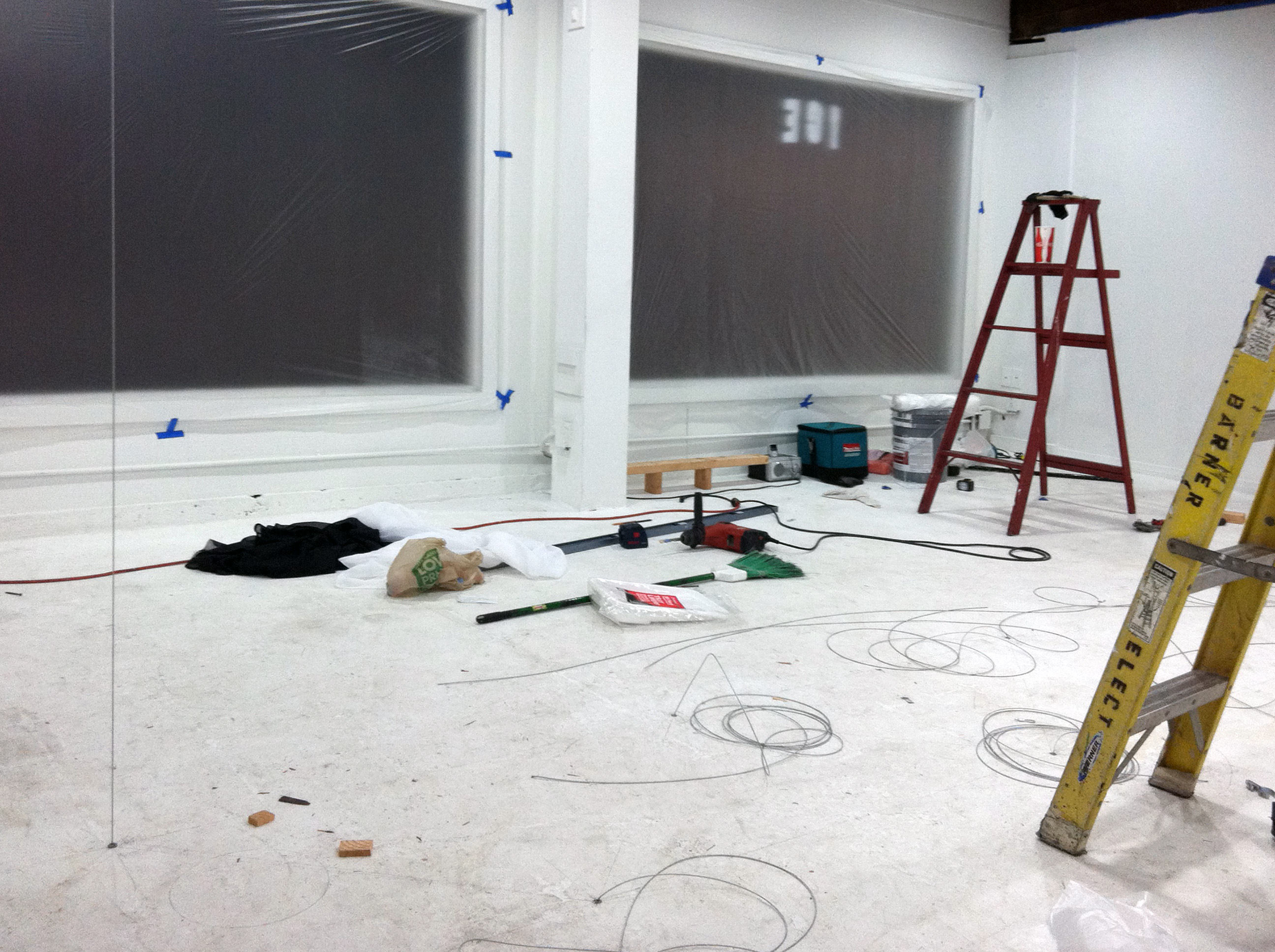 Concrete floor, hammer drill, and wire rope – Ice Gallery